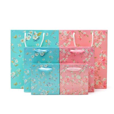 China Custom Flower Pattern Cardboard Tote Bags - 300,000 Monthly Capacity, 20-Day Production, Multiple Material Options for sale