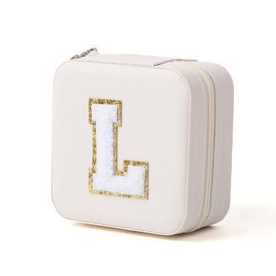 China Small White Leather Travel Organizer Case for Jewelry Storage - Compact Design with Multiple Compartments for sale