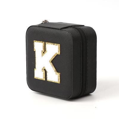 China Luxury Black Leather Jewellery Storage Box with Custom Logo - Portable Travel Case for Rings and Earrings for sale