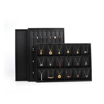 China Custom Luxury Black Leather Jewelry Display Trays OEM with 300,000 Monthly Capacity and 20-Day Production for sale