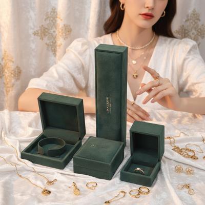 China Dark Green Velvet Jewelry Box with Multiple Compartments and Magnetic Closure for Rings, Necklaces, and Bracelets for sale