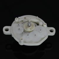 China POM Plastic Injection Moulded Plastic Auto Part Over Moulding White Motorhalter for sale
