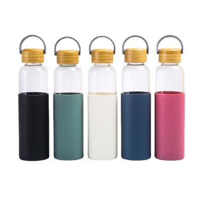 China Single Wall High Borosilicate Glass Drink Water Bottle Colorful Silicone Cover for sale