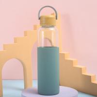 China Single Wall High Borosilicate Glass Drink Water Bottle Colorful Silicone Cover for sale