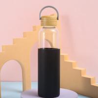 China Single Wall High Borosilicate Glass Drink Water Bottle Colorful Silicone Cover for sale