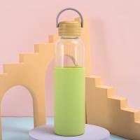 China Single Wall High Borosilicate Glass Drink Water Bottle Colorful Silicone Cover for sale
