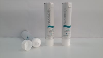 China 4oz Glossy / Matt Varnish Surface Soft Toothpaste Tube Containers Top Silver Rim Tall Flip on Cap for sale