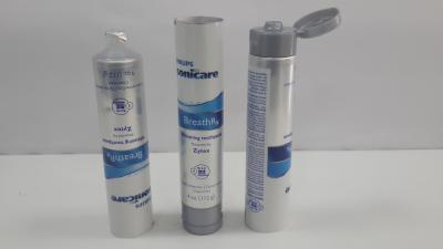 China 4oz Flexographic Printing Silver Toothpaste Tube With Translucent Shoulder Flip On Cap for sale
