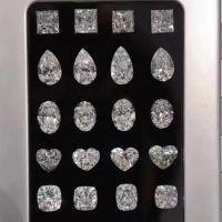 China Loose Melee Diamonds 0.7 To 1.35mm White Round Shape DEF Color VVS Clarity for sale
