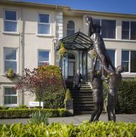China Bronze Rugby Sculpture 6m Outdoor Metal Art Statue for Hotel Custom Cast Patina Finish for sale