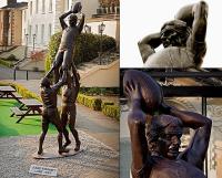China Bronze Rugby Sculpture 6m Outdoor Metal Art Statue for Hotel Custom Cast Patina Finish for sale