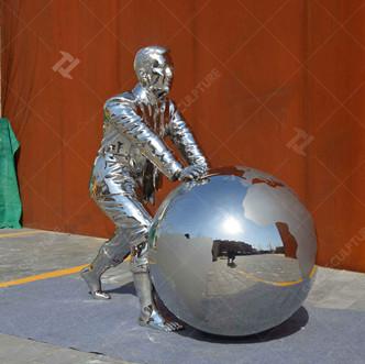 China Outside Stainless Steel Sculpture Casting Mirrored Figure And Globe for sale