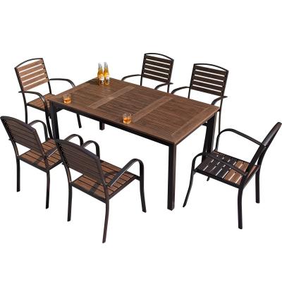 China Weatherproof Outdoor Patio Dining Set 4 Seats Composite Wood Table Chairs UV Resistant Garden Furniture for sale