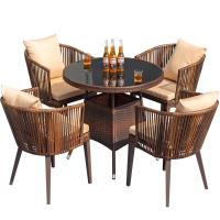 China Outdoor Patio Rattan Chair and Table Set 4 Piece Garden Wicker Dining Set Weatherproof UV Resistant for Balcony Terrace Deck for sale