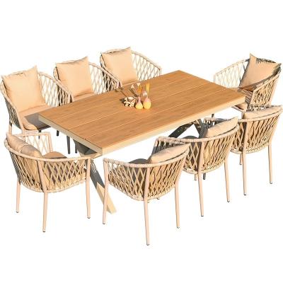 China Luxury Nordic Style Weatherproof Rattan Outdoor Dining Set 6 Seater Patio Garden Furniture for sale