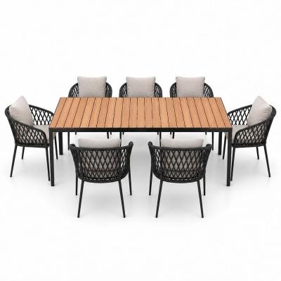 China Modern Outdoor Dining Set 6 Seats Matte Gray Table Natural Tan PE Rattan Chairs Dark Gray Frame for sale