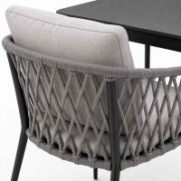 China Outdoor Dining Set with Gray Rope Woven Armchairs Matte Dark Charcoal Tabletop and Thick Light Gray Cushions for sale