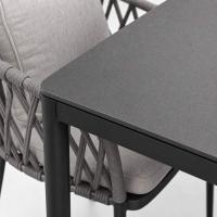 China Outdoor Dining Set with Gray Rope Woven Armchairs Matte Dark Charcoal Tabletop and Thick Light Gray Cushions for sale