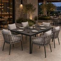 China Outdoor Dining Set with Gray Rope Woven Armchairs Matte Dark Charcoal Tabletop and Thick Light Gray Cushions for sale