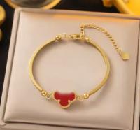 China Waterproof Black Red Clover Bangle 18K Gold Stainless Steel Four Leaf Bracelet for sale