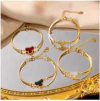 China Waterproof Black Red Clover Bangle 18K Gold Stainless Steel Four Leaf Bracelet for sale