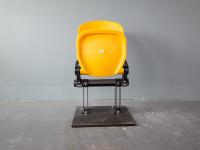 China Gas Assisted Plastic Stadium Chair With Floor Mounted Brackets for sale