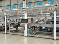China High-Speed Carton Packer for Beverage Production - 100 Packs/Min, 15850mm Length, 30KW Power for sale