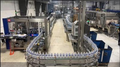 China SPCTTB Fully Automatic Hot Melt Adhesive OPP Labeling Machine - 53,000 BPH Capacity for Bottled Water Production Lines for sale