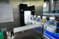 China 60000BPH Hot Melt Adhesive Labeling Machine with 360-Degree Inspection for Bottle Packaging Quality Control for sale