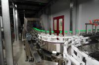 China 18,000 BPH Bottle Conveying System with SUS304 Stainless Steel and R500mm Bending Radius for Aseptic Lines for sale