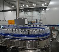 China SUS304 Air Conveyor for 42,000 BPH Bottled Water Production Line with 2.5mm Stainless Steel Construction for sale