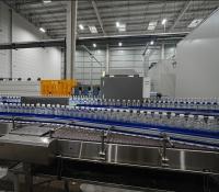 China 42,000 BPH Bottle Transfer System with SUS304 Stainless Steel and R500mm Bending Radius for Water Production Lines for sale