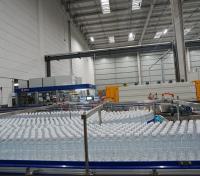 China Durable Dynamic Bottle Buffer Platform For 42,000 BPH Bottled Water Production Robust Motorized Control for sale