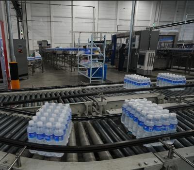 China SUS304 Stainless Steel Belt Chain Roller Conveyor 42000 BPH Bottled Water Production Line for sale
