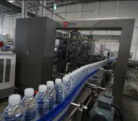 China Hot Melt Adhesive Label Applicator Machine - 48,000 BPH Speed with ±1mm Accuracy for Bottle Labeling for sale