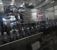 China Automatic Hot Melt Labeling System SPCTTB.RH30 - 48,000 BPH High Speed with ±1mm Accuracy for Bottles for sale