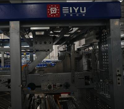 China Adjustable Speed Bottled Water Packaging Machine 60-120 Packs/Min with 1.2m-2.4m Heat Tunnel for sale