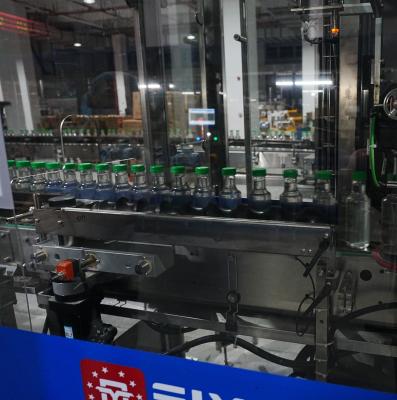 China Automatic Double-Head Sleeve Labeling Machine 9000-72000 BPH 50-95mm Bottle Diameter for sale