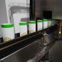 China Automatic Sleeve Labeler 42,000 BPH for Bottles 50-95mm for sale