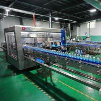 China Full Automatic PET Bottled Water Packaging Machine 32000 BPH 100-2000ml for sale