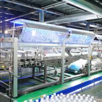 China Automatic High-Speed Shrink Wrapping Machine 12000-36000bph 380V Stainless Steel 304 for Bottles for sale