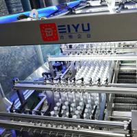 China Automatic Shrink Packer 12000-48000 BPH Heat Shrink Film Packaging Machine 380V 75KW for sale