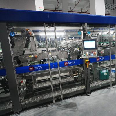 China Chain Type Case Packer 18 Cartons/min PLC Touch Screen Bottle Shortage Alarm Automatic Paper Caser for sale