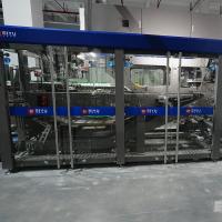 China 30 Cases Per Minute Fully Wrapped Winding Wrap Around Case Packer for Aseptic Packaging Line for sale