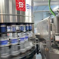 China Automatic Hot Melt Labeling System SPCTTB.RH30 - 48,000 BPH High Speed with ±1mm Accuracy for Bottles for sale