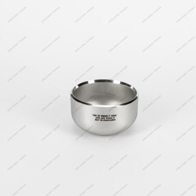 China ASTM A234 A815 Stainless Steel Butt Welded Sand Rolling SS Butt Welded End Cap for sale