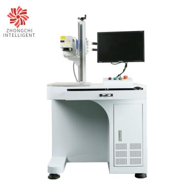 China 0.1mm CO2 Laser Marking Machine 30W Plastic Tag Engraving Machine FDA for sale