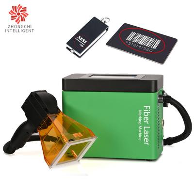 China 50W Handheld Integrated Laser Marking Machine FDA 1064nm Portable For Metal for sale