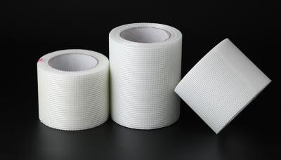 China Self adhesive Plain Woven Fiberglass Tape Strength Alkali Resistant for sale