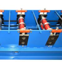 China Metal Roof Tile Ridge Cap Sheet Roll Forming Machine With Hydraulic Punching Stamp for sale